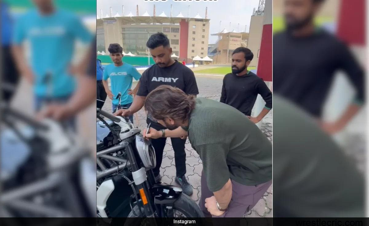 MS Dhoni Wins Hearts, Provides Autograph On Fan's Bike - Video Goes ...